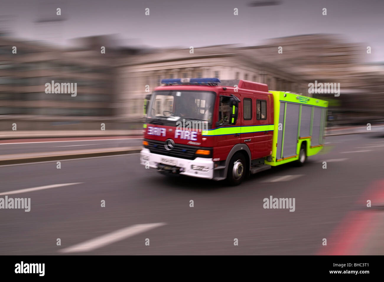 London Fire engine on call in the City district Stock Photo - Alamy