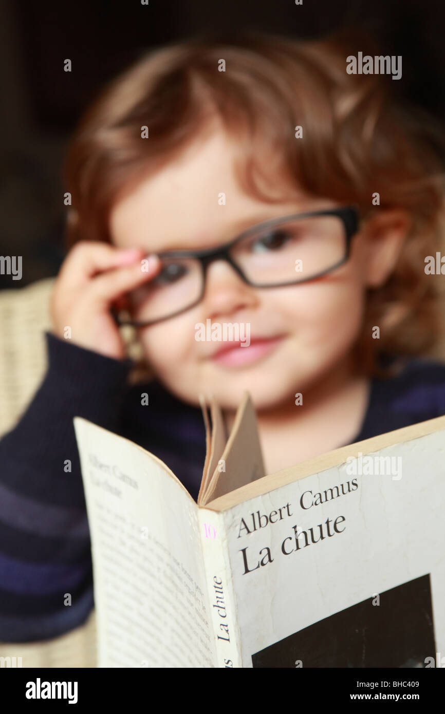 A twenty months old baby girl meaning that she reads for real with fake ...
