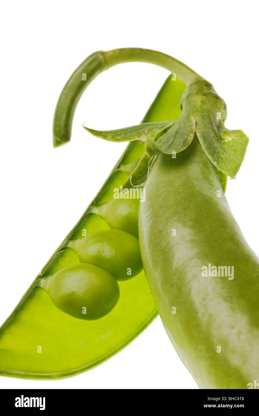 green pea pod isolated on a white background Stock Photo - Alamy