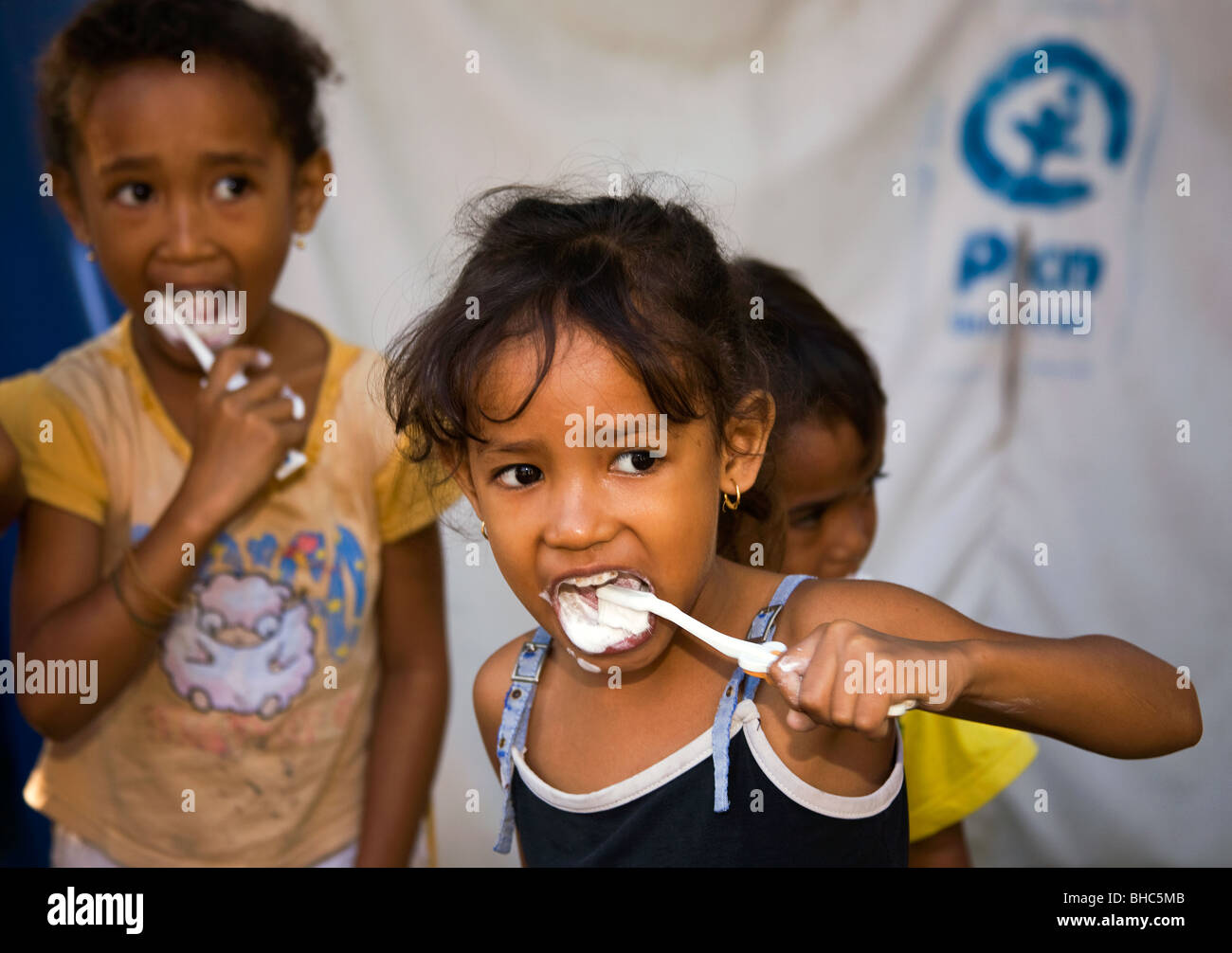 Cleaning teeth PLAN provide water sanitation toothbrushes toothpaste ...