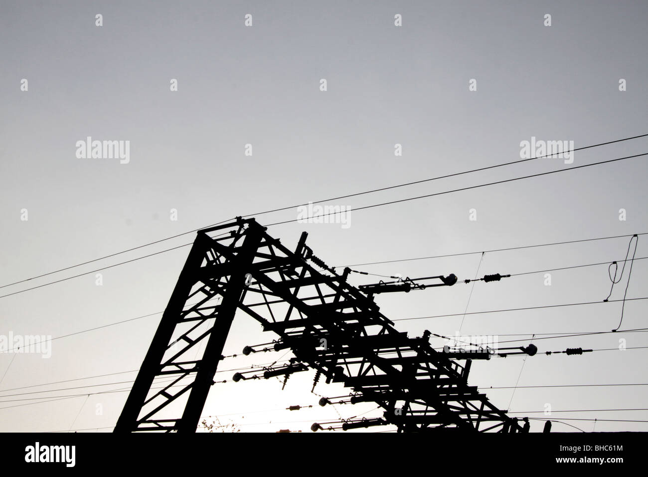 Electric power cables above a railway line in London Stock Photo - Alamy