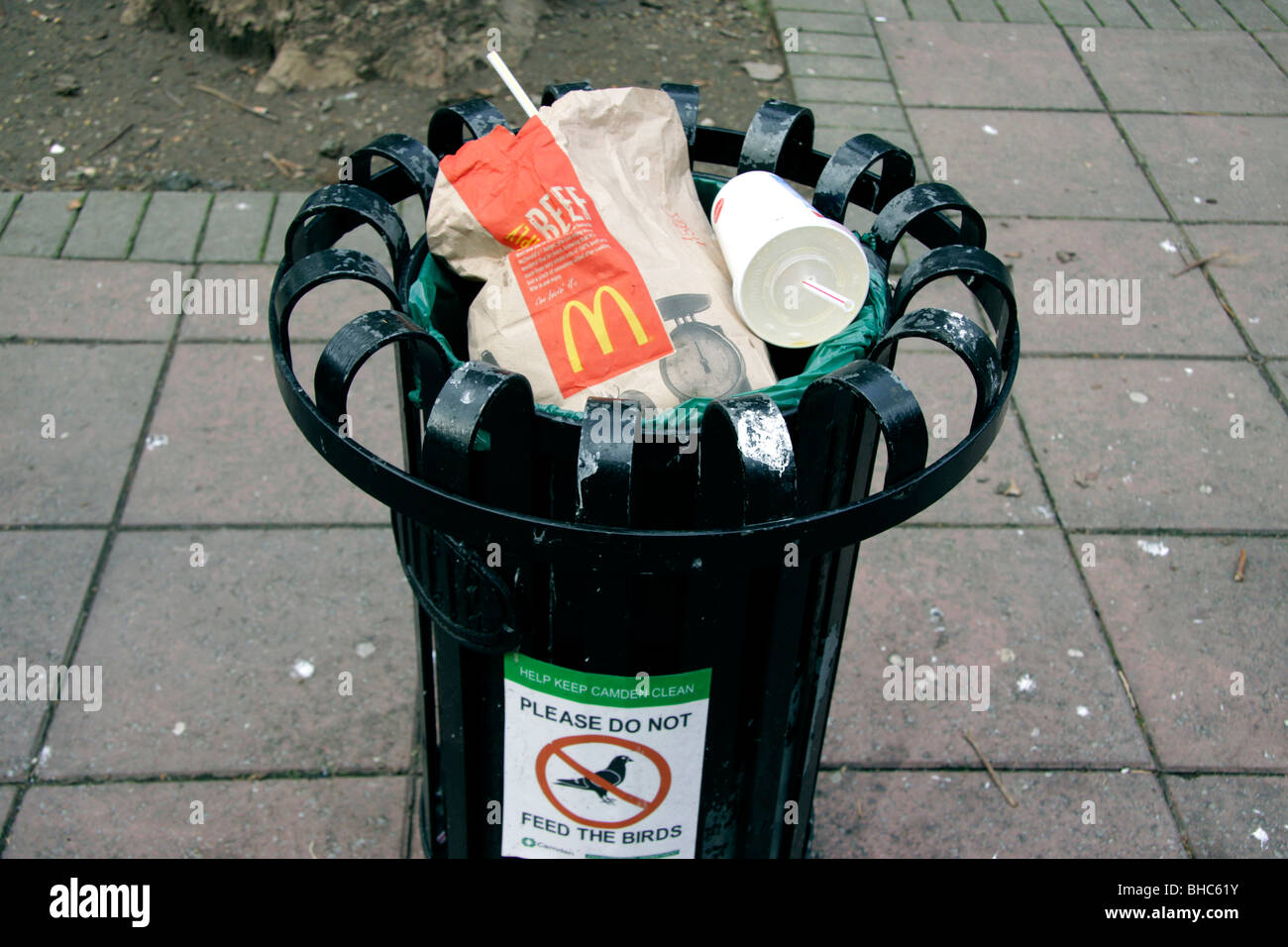 Fast food packaging in a litter bin Stock Photo - Alamy