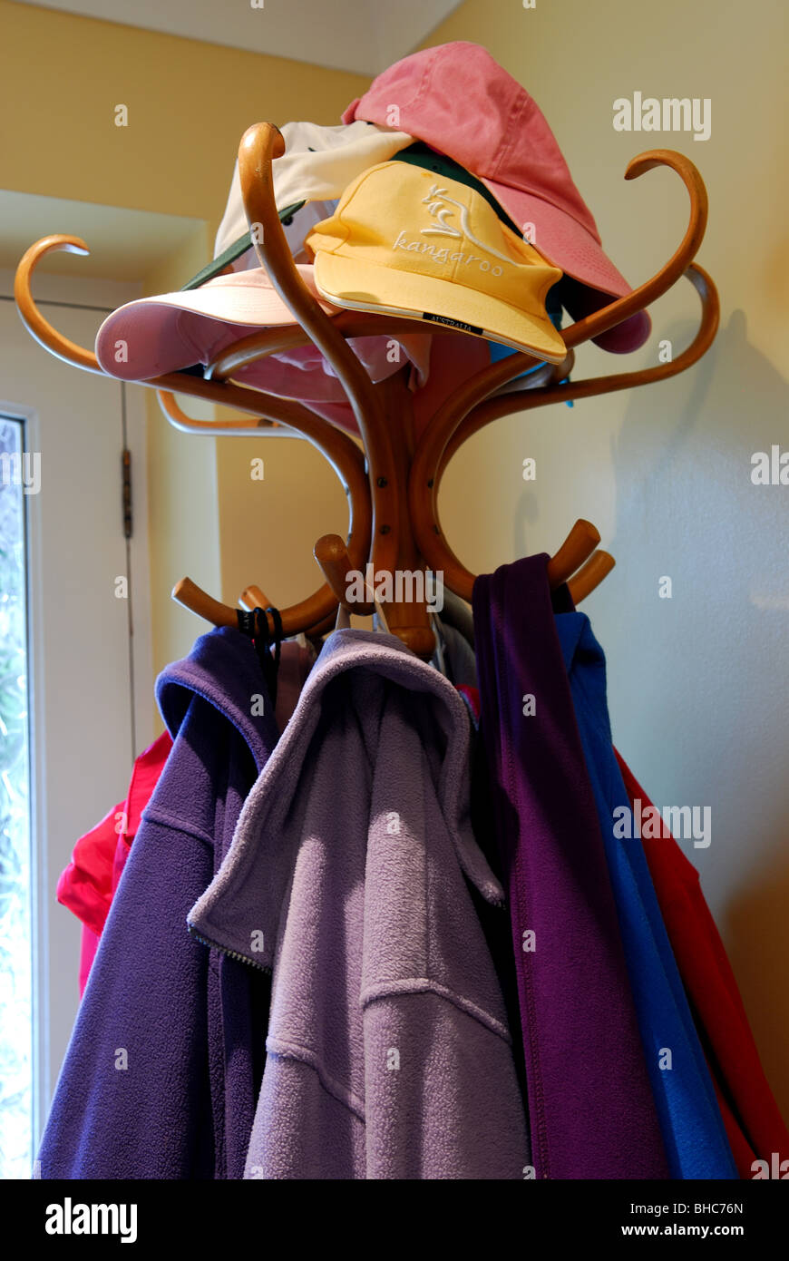 Hat Stand Colourful Hats and Coats Stock Photo - Alamy