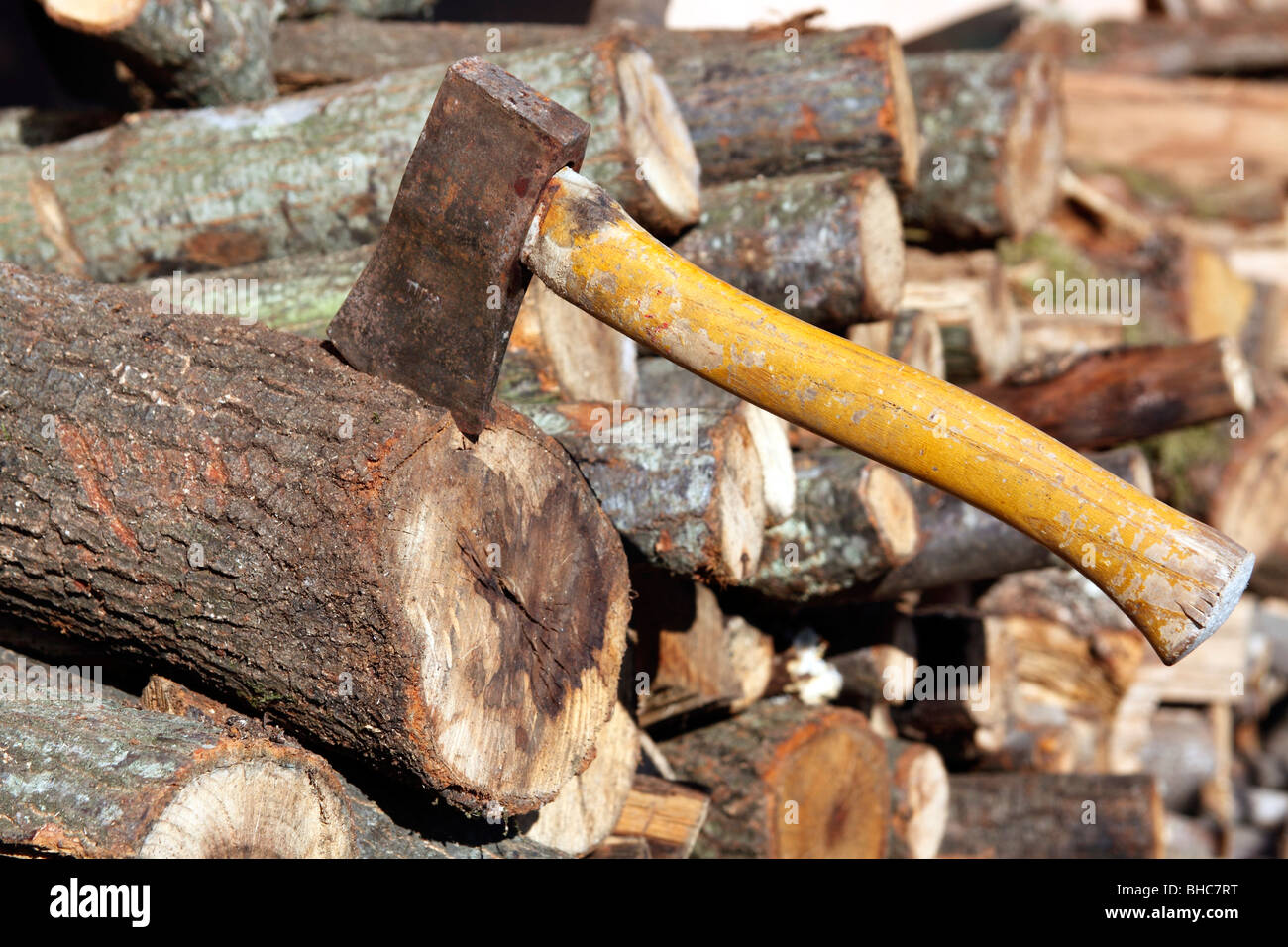 An old ax and some logs Stock Photo - Alamy