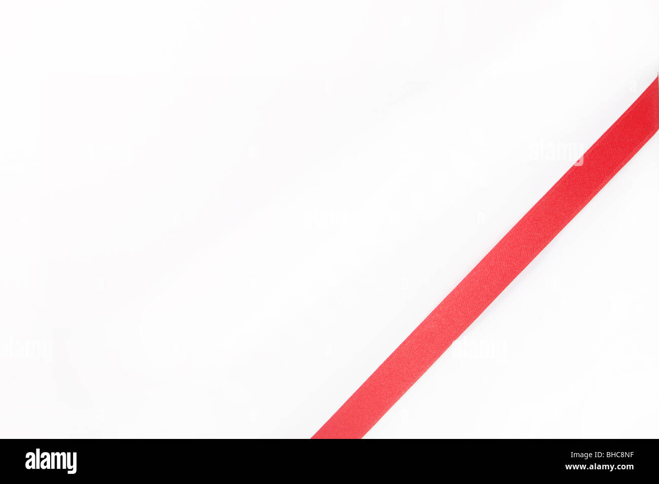 Red ribbon - right side on a white background Stock Photo - Alamy