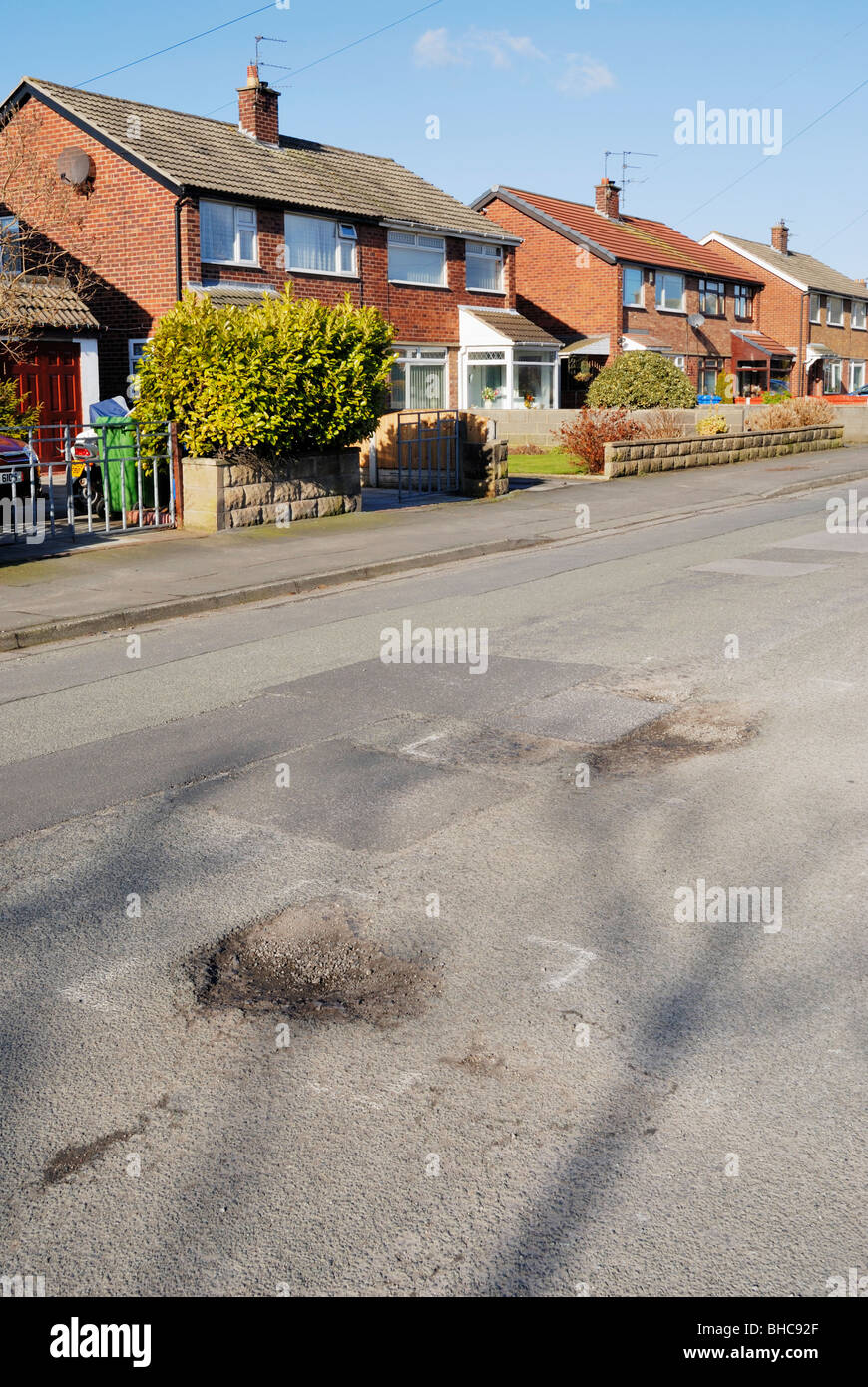 Pothole in road surface on road in Cheshire, UK Stock Photo - Alamy
