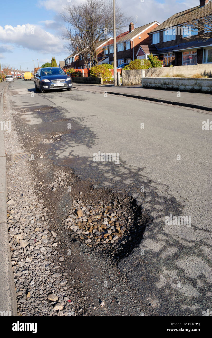 Pothole In Road Stock Photos & Pothole In Road Stock Images - Alamy