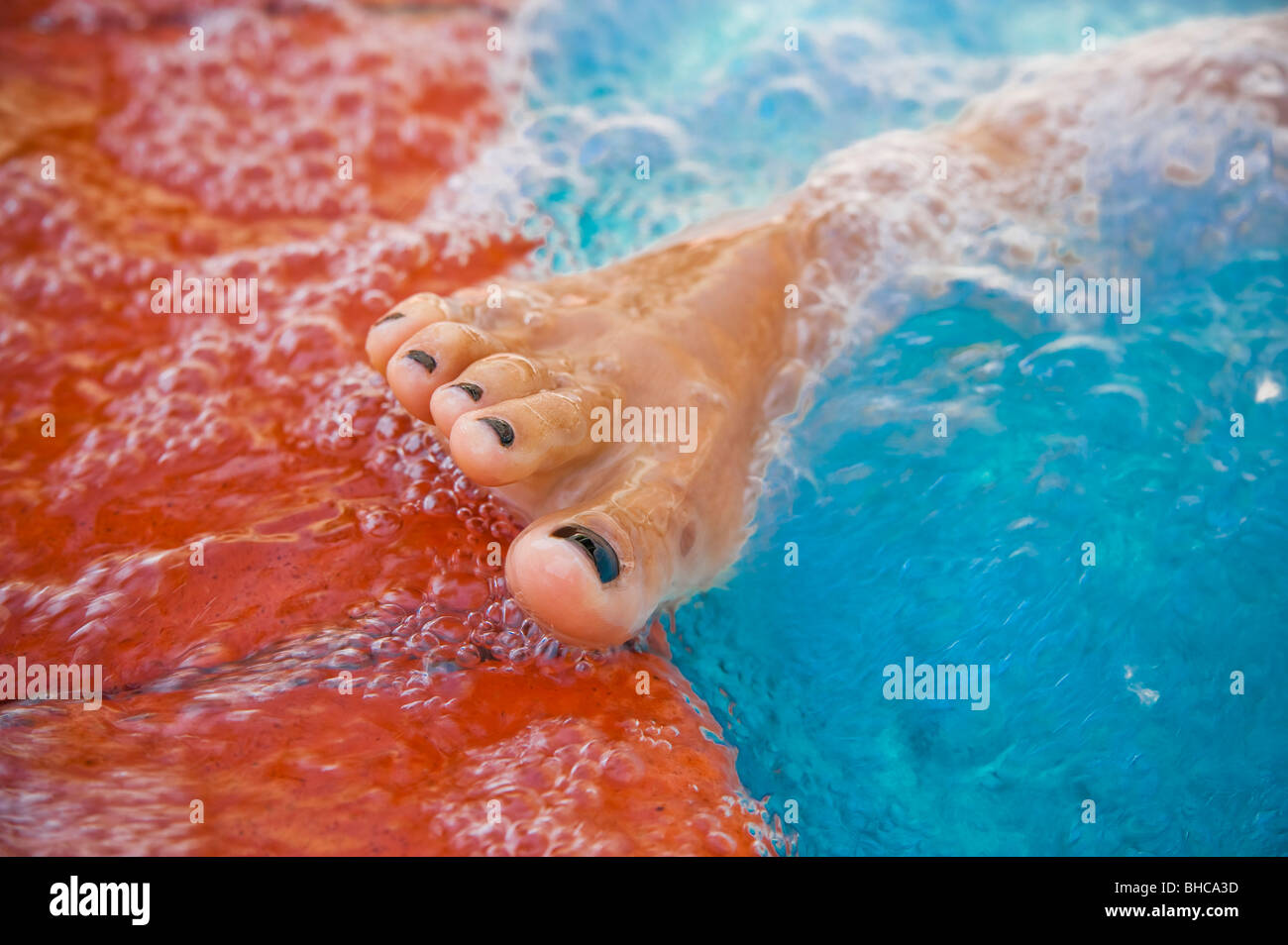Foot in whirlpool bath Stock Photo - Alamy