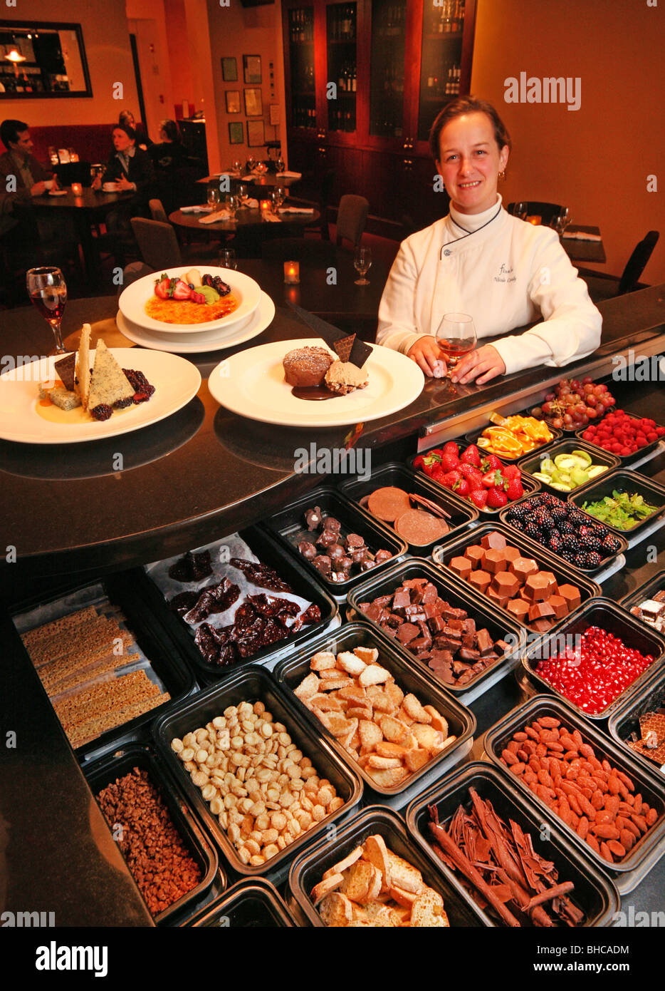 Pastry chef in dessert cafe Stock Photo - Alamy