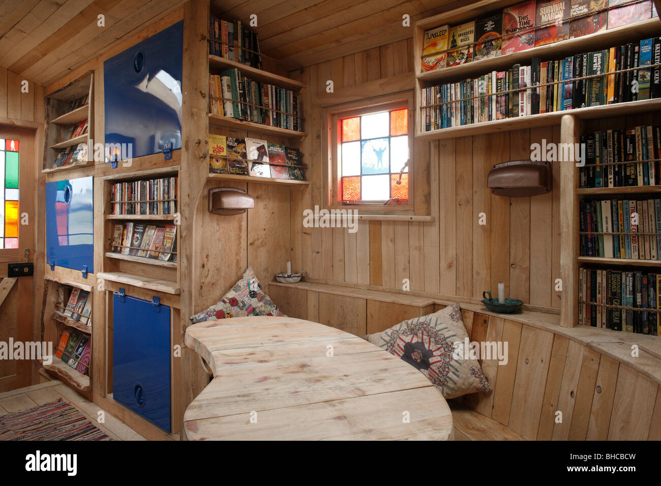 Heather and Ivan Morison's sci-fi library in a wooden trailer Stock ...