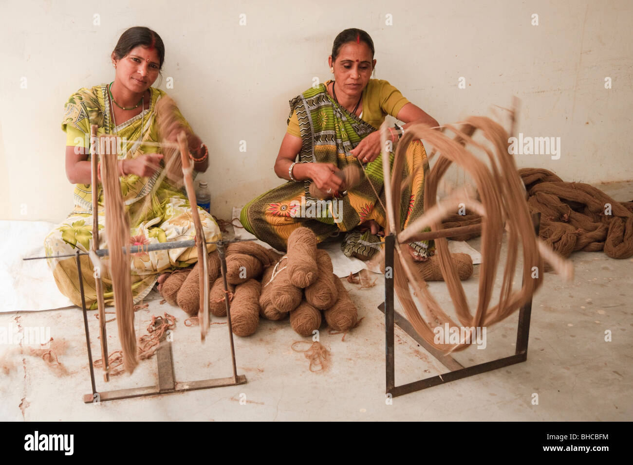 Indian women spinning wool, Rajasthan, India Stock Photo - Alamy