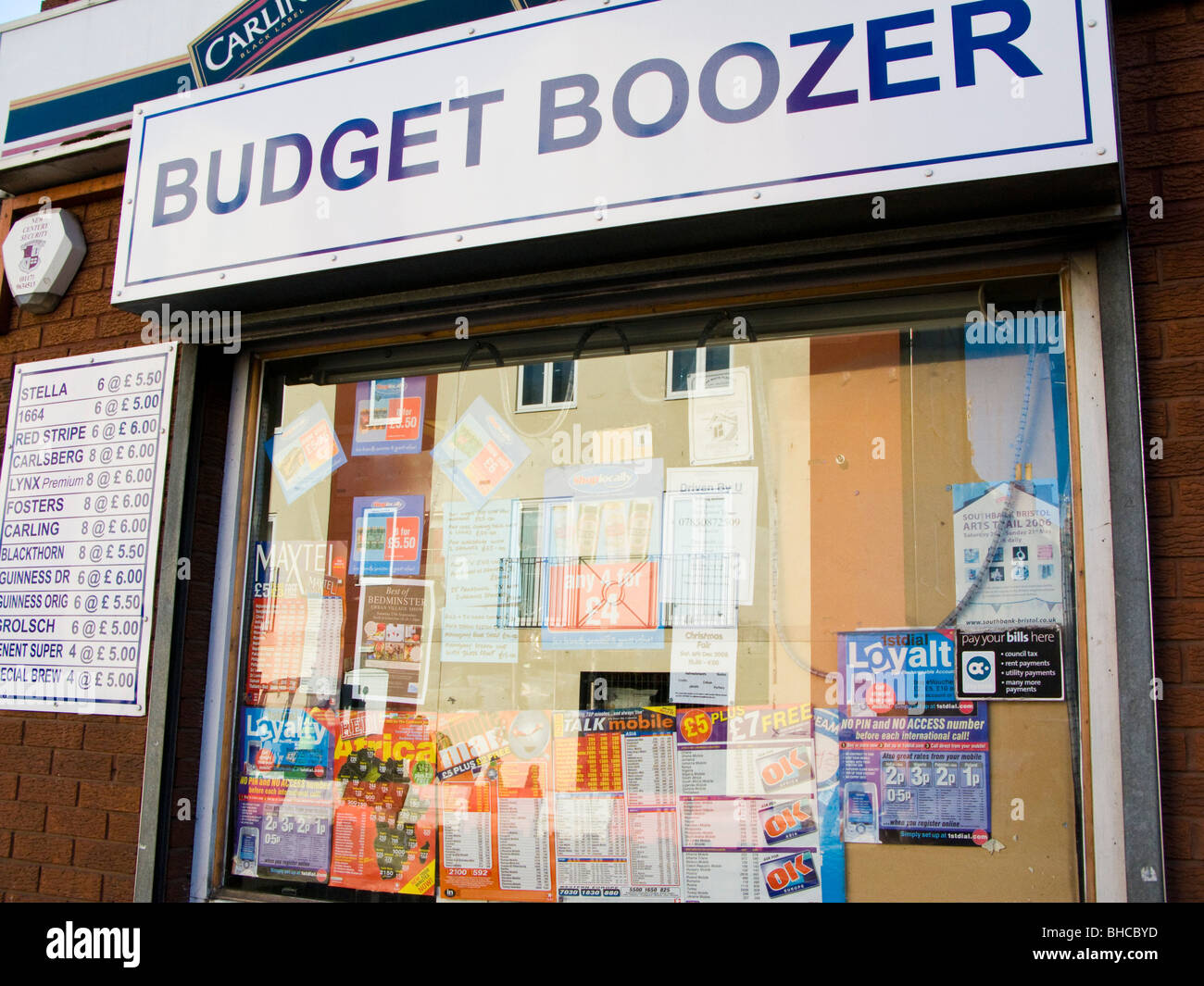Run down area of Bristol, Bedminster, with disused and abandoned shops ...