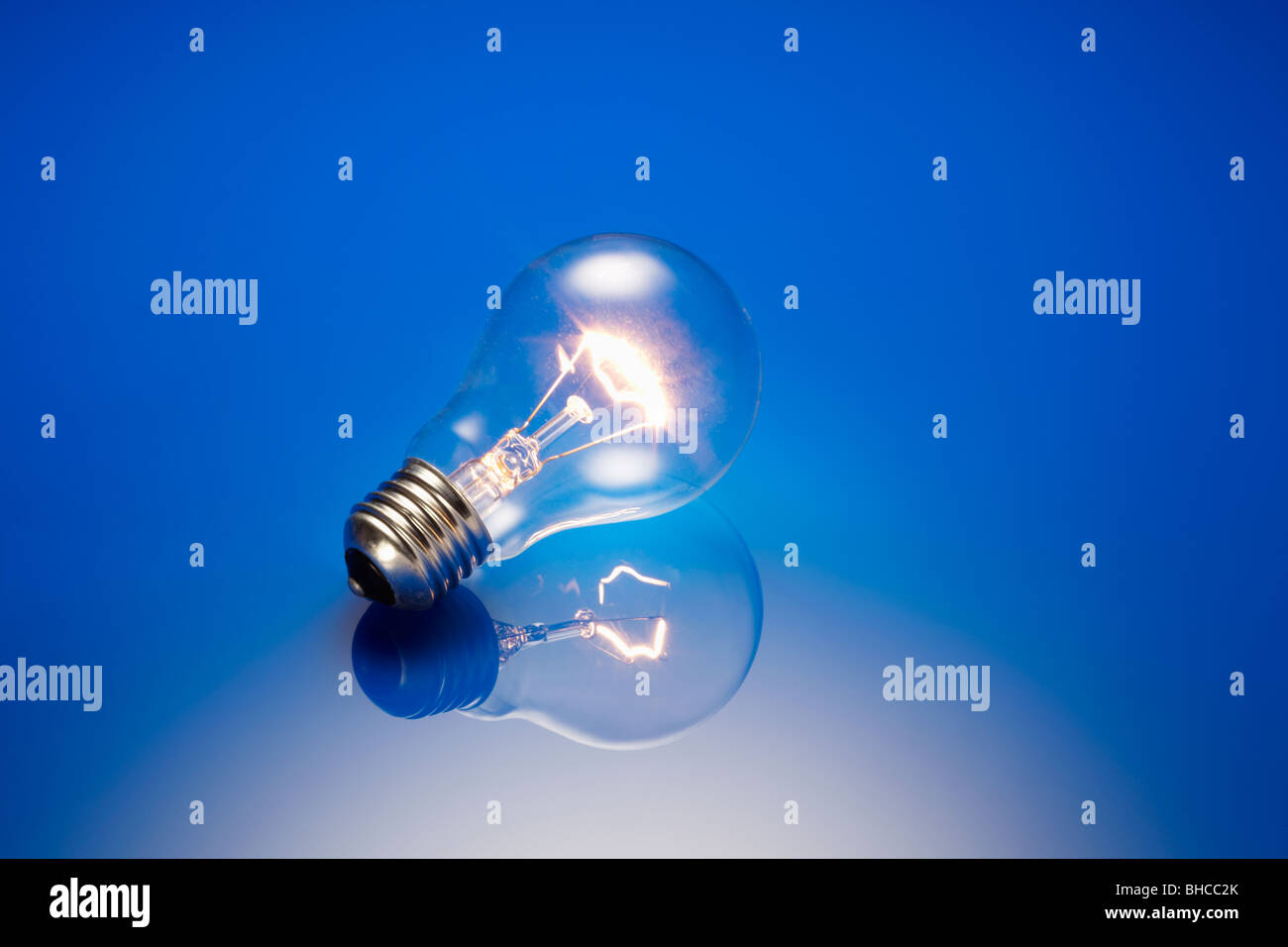 Clear Standard Light Bulb Illuminated Stock Photo - Alamy