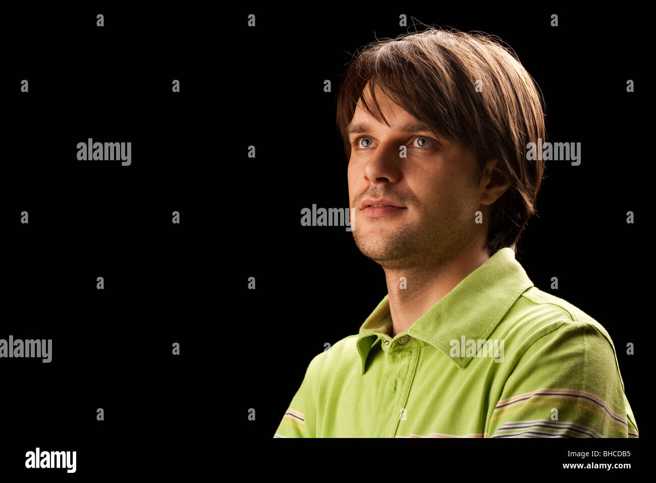 Low key portrait of a handsome young man Stock Photo - Alamy