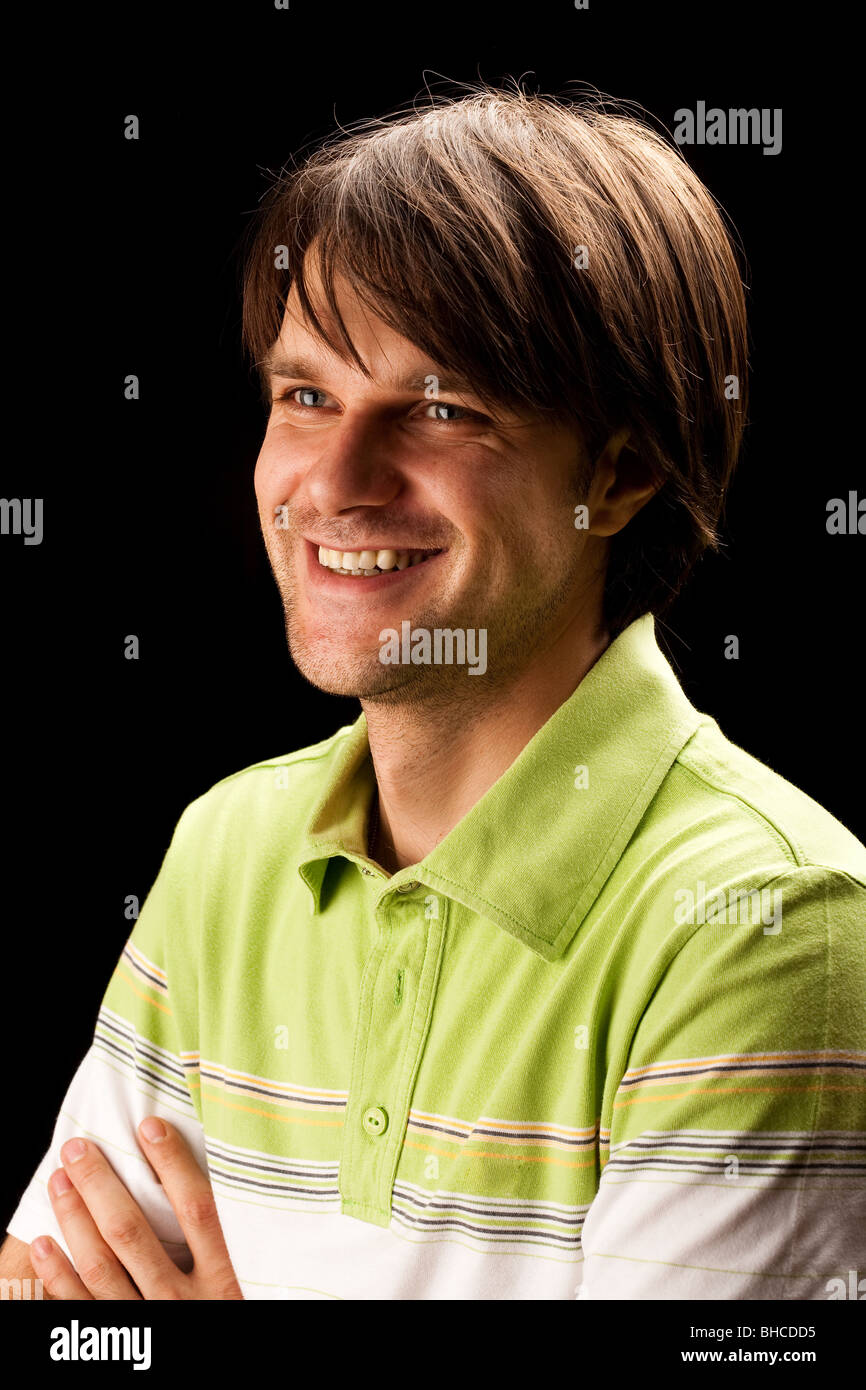Low key portrait of a handsome young man Stock Photo - Alamy