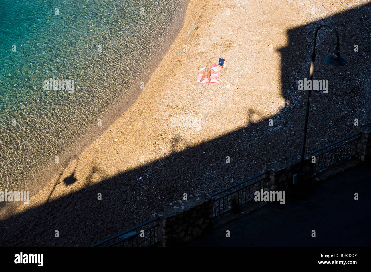 Sunbathing at beach hi-res stock photography and images - Alamy