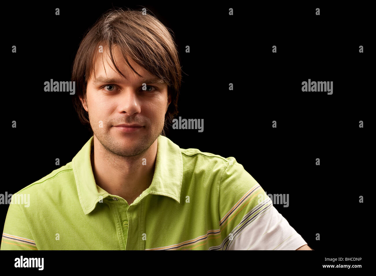 Low key portrait of a handsome young man Stock Photo - Alamy