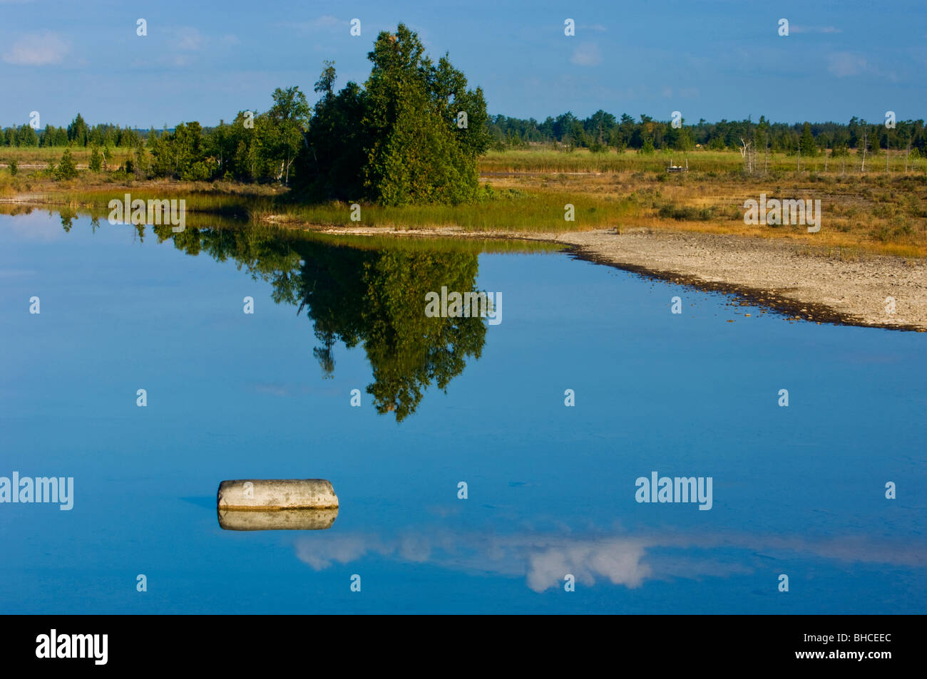 Calm waters in shallow pond in alvar landscape, Little Current ...