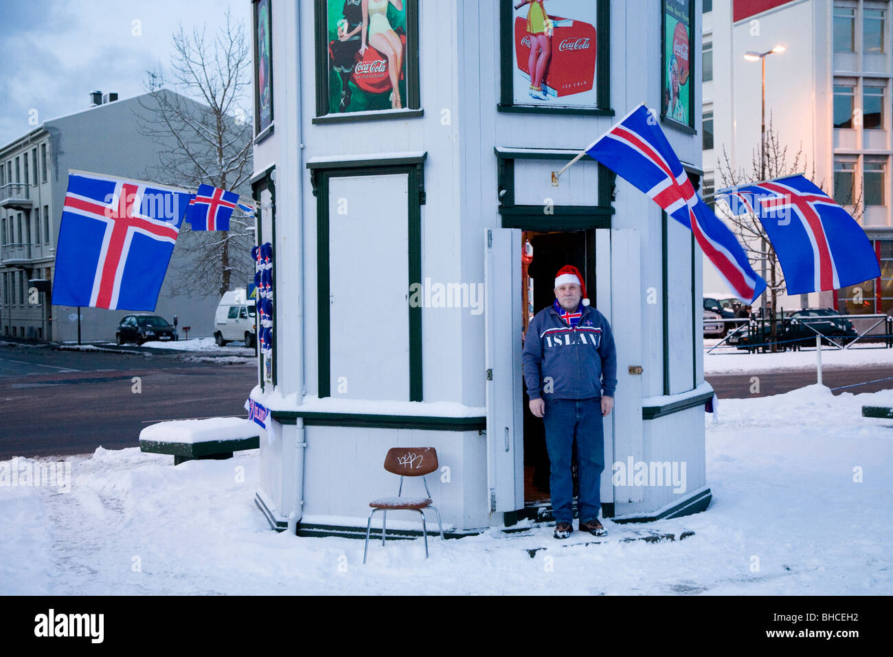 Man selling souvenirs to support Icelandic sports teams. Downtown ...