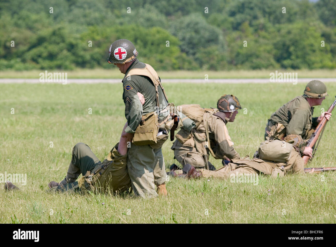 World War II reenactment of a battle between American infantryman and ...