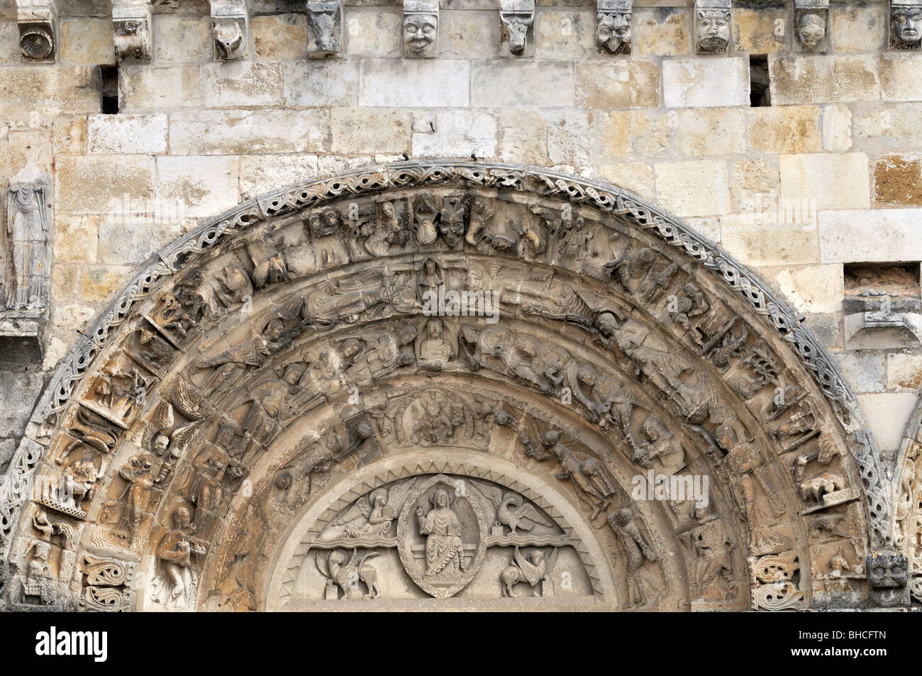 Detail from the decorative portal of the Romanesque church at Civray ...