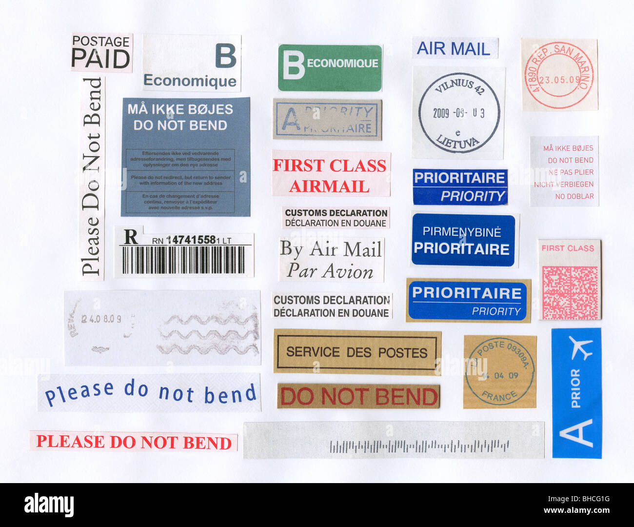 Collection of postage seals from worldwide mail Stock Photo - Alamy