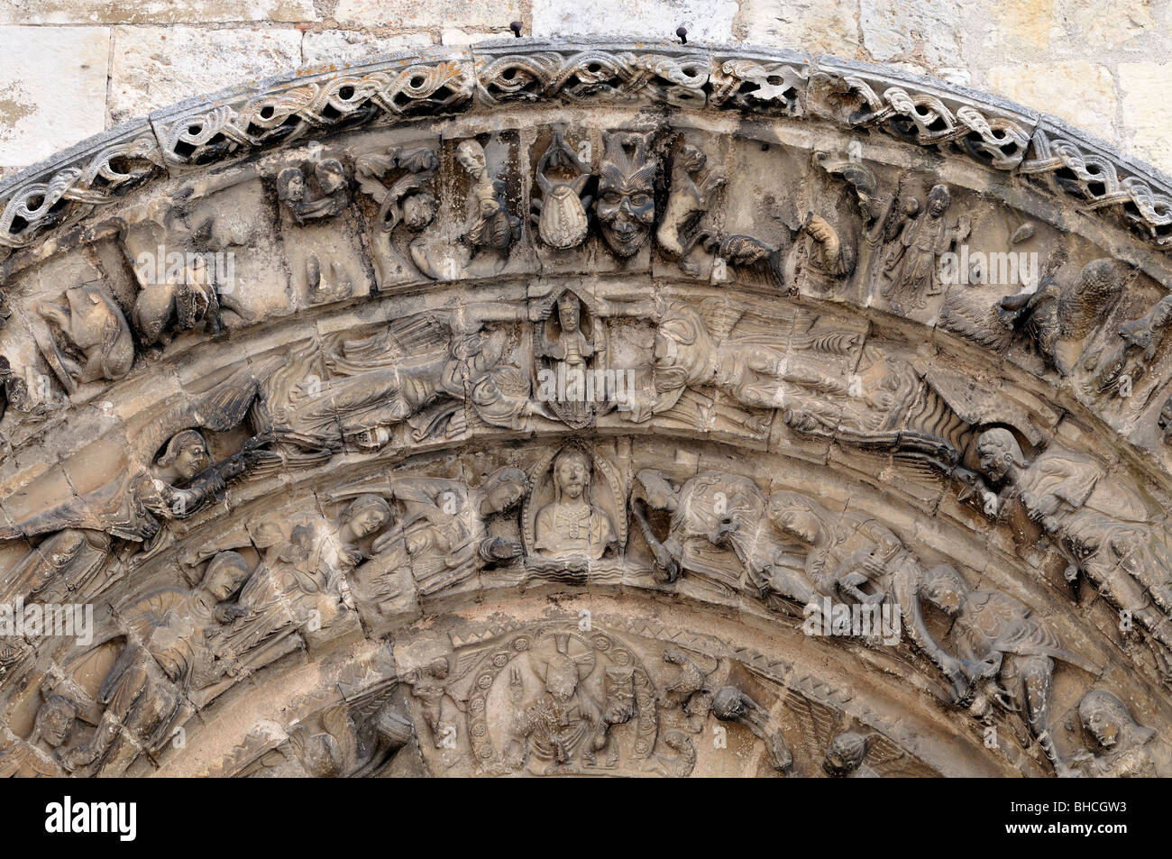Detail from the decorative portal of the Romanesque church at Civray ...