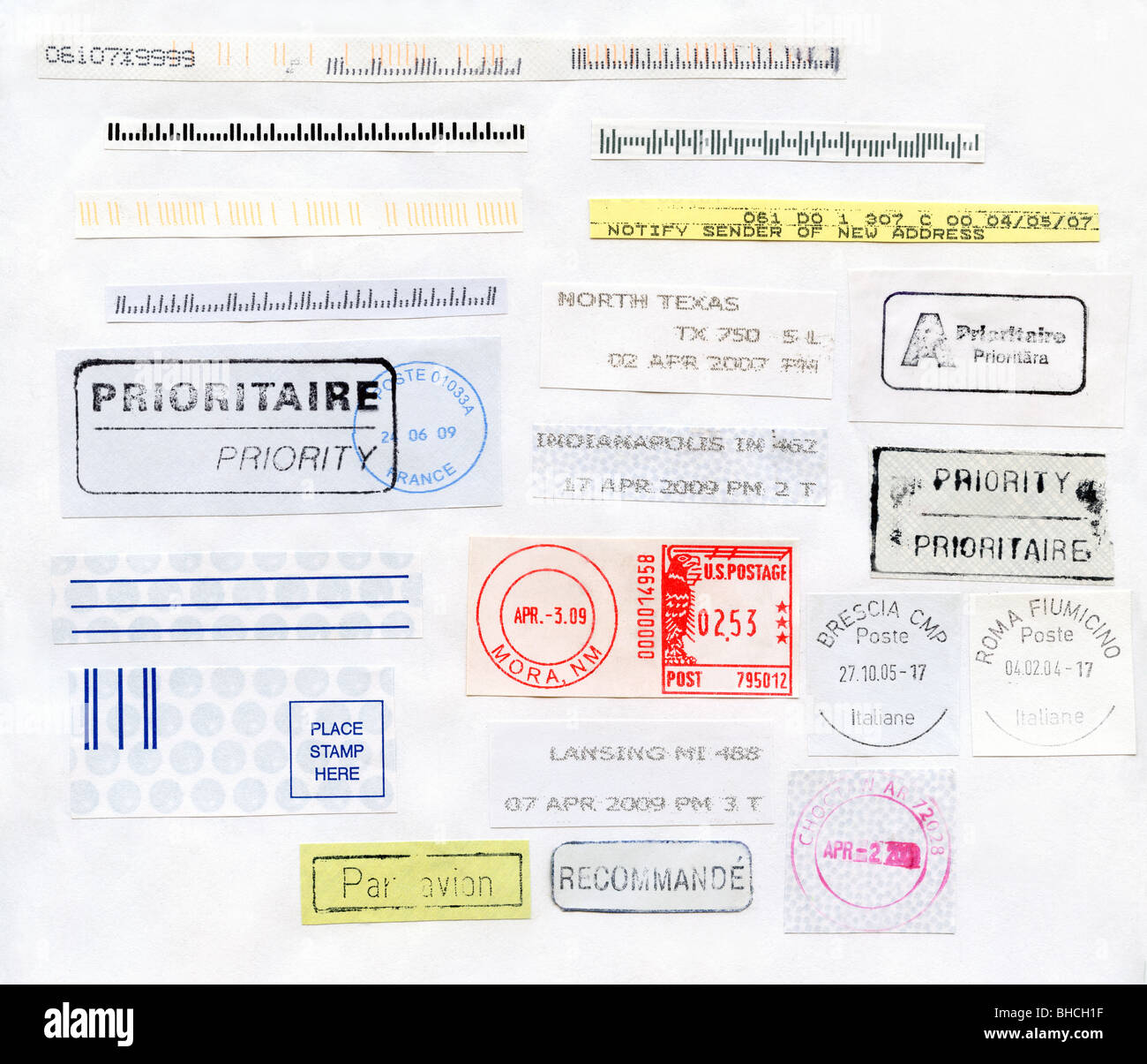 Collection of postage seals from worldwide mail Stock Photo - Alamy