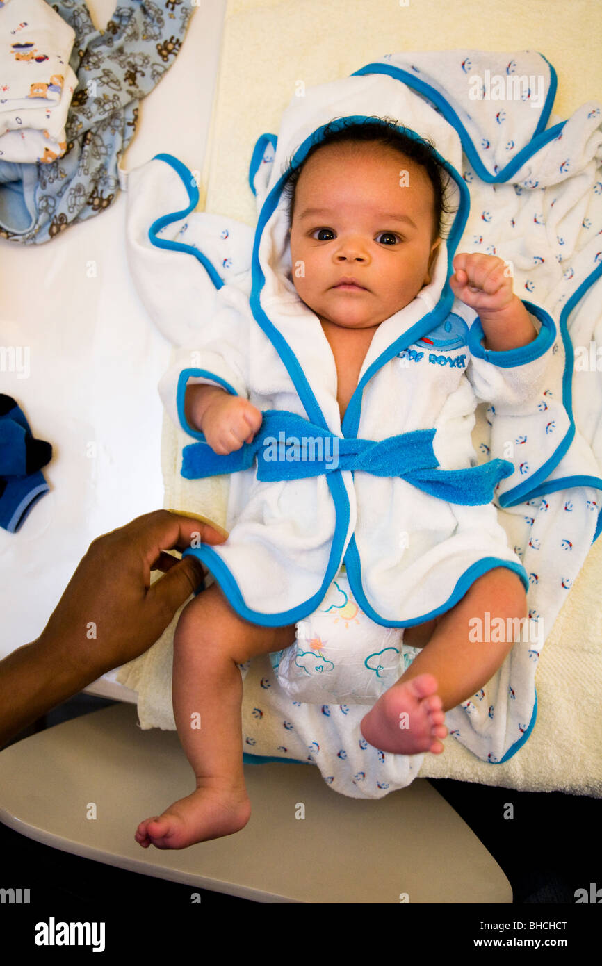 Two months boy wearing a robe Stock Photo - Alamy
