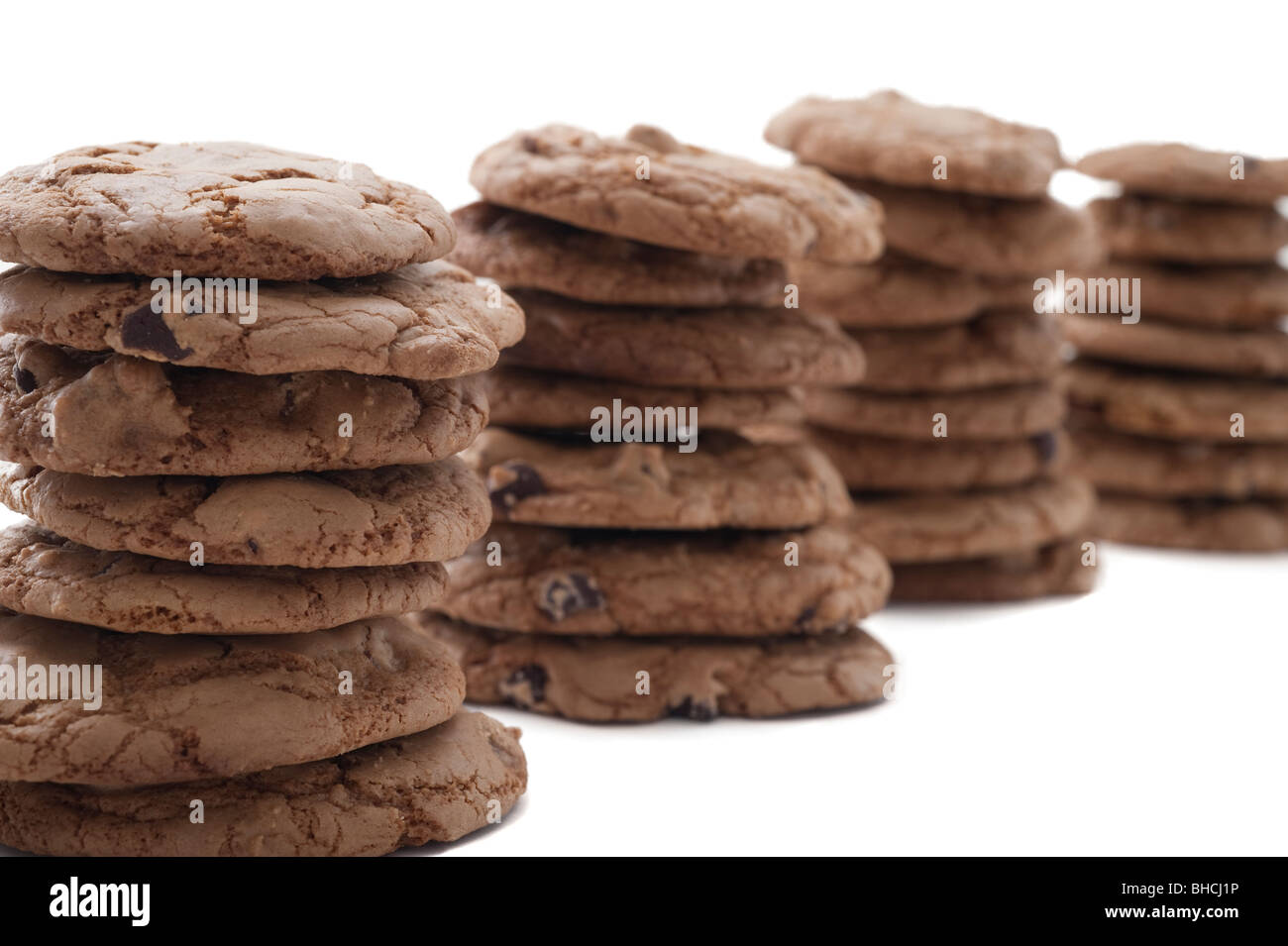 Stacks of chocolate chip cookies arranged in a row Stock Photo - Alamy