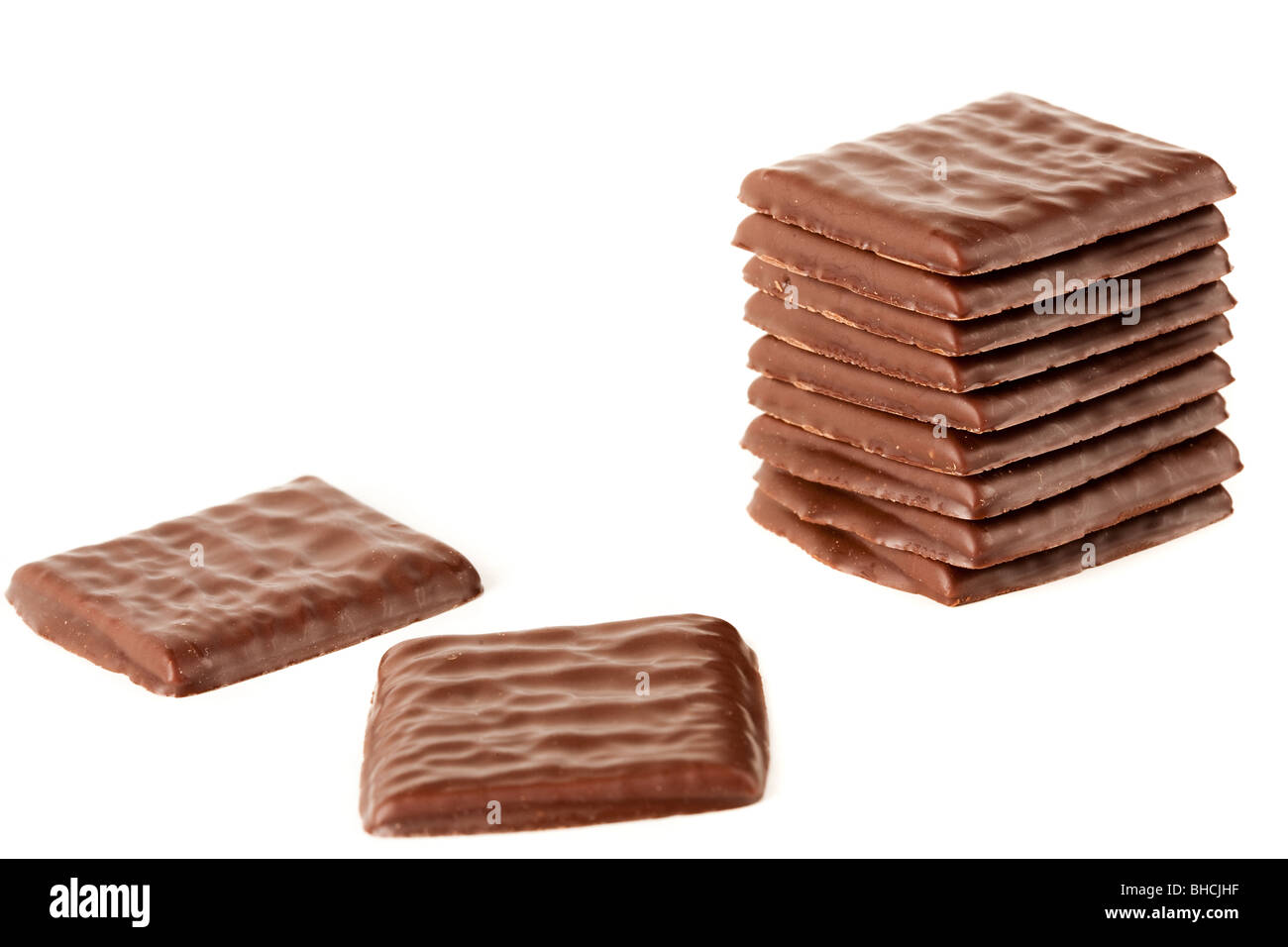 Close up of a stack of chocolate isolated on white background Stock ...