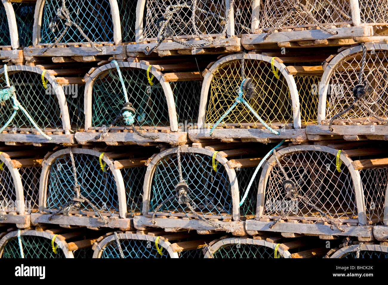 Lobster traps sitting on the wharf Stock Photo - Alamy