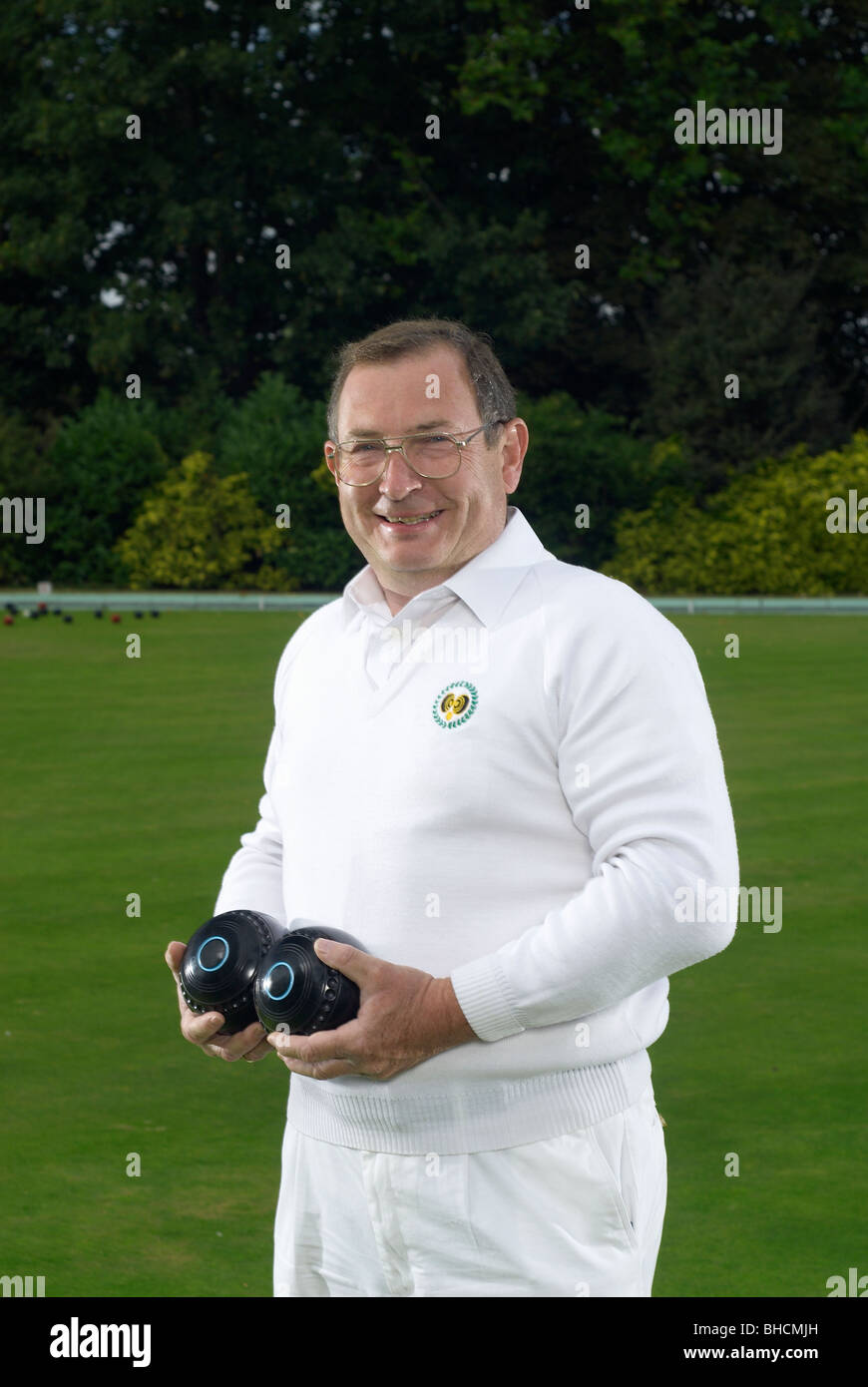 male bowler at green Stock Photo - Alamy
