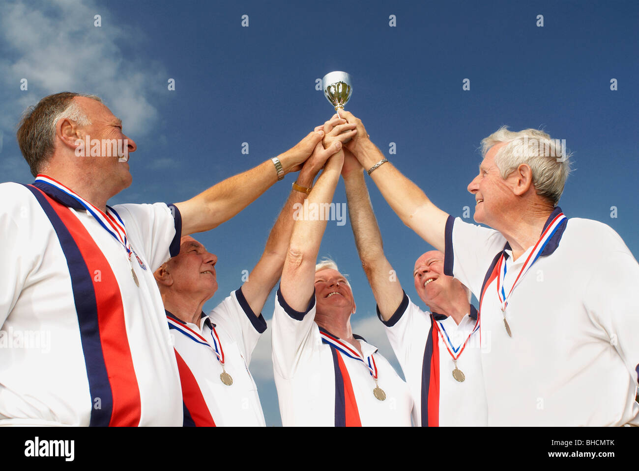 men and trophy Stock Photo - Alamy