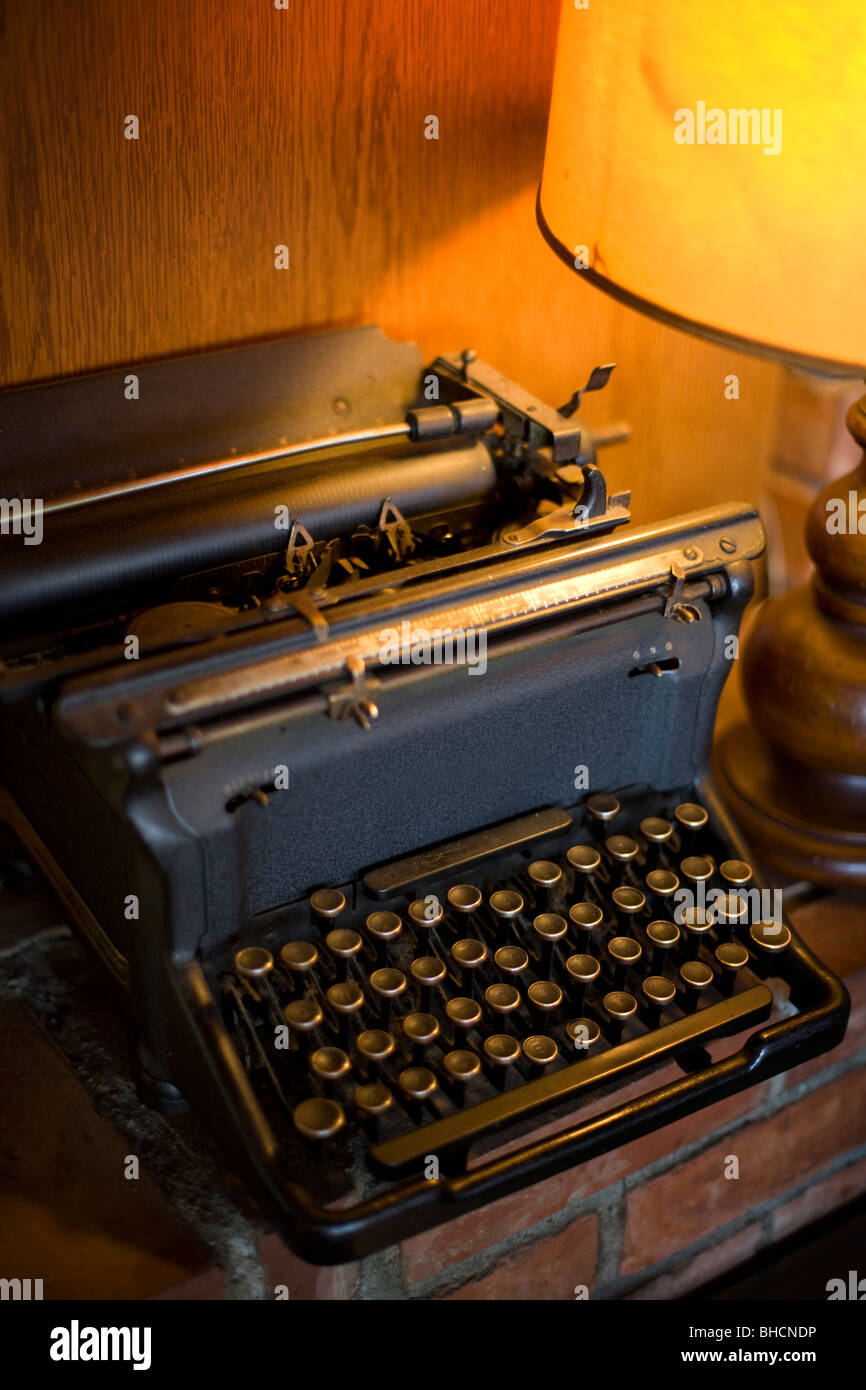 Typewriter and lamp Stock Photo - Alamy