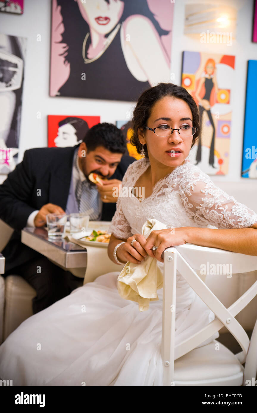 Bride eating pizza hi-res stock photography and images - Alamy