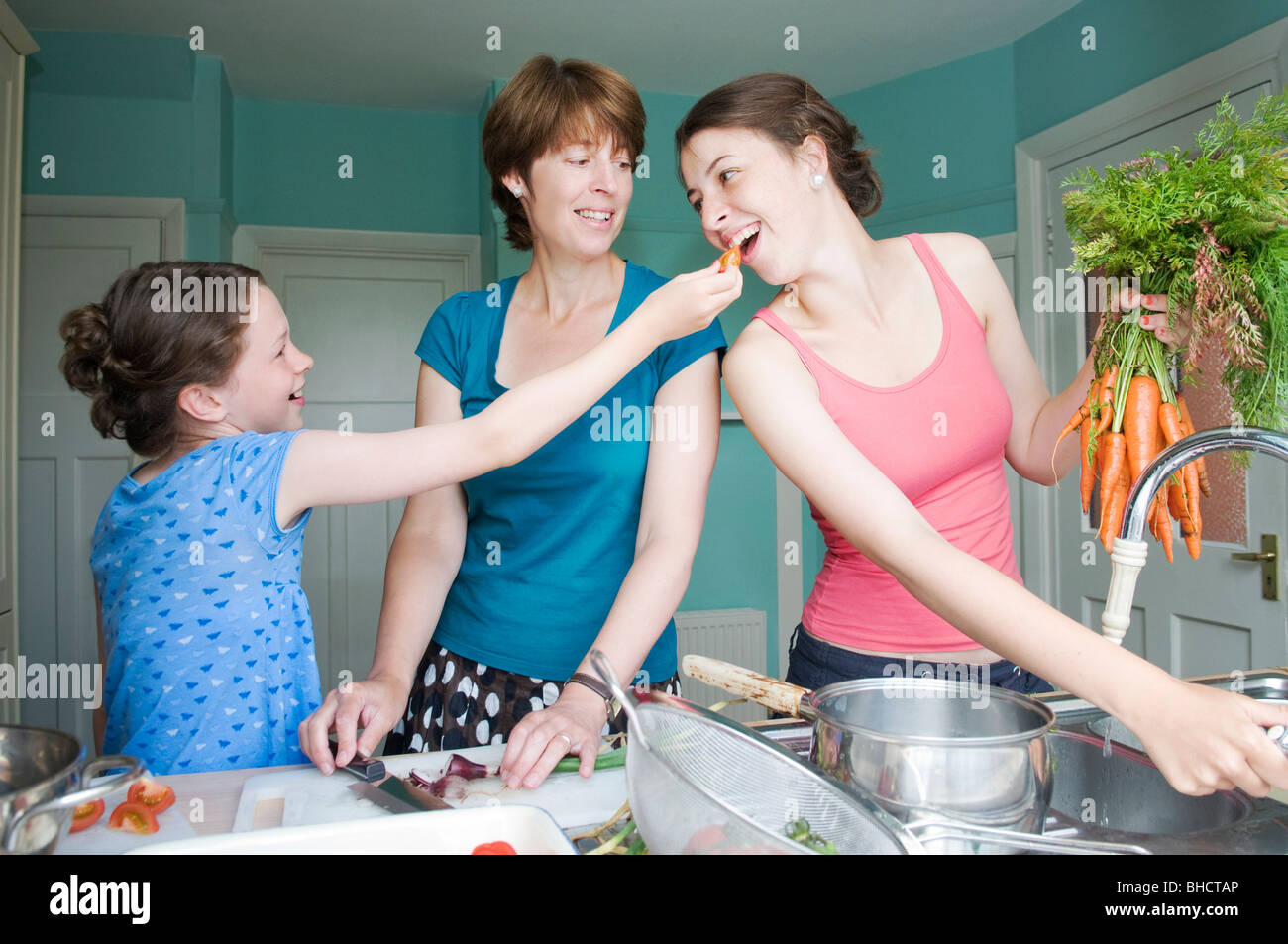 Two daughters adoring hi-res stock photography and images - Alamy