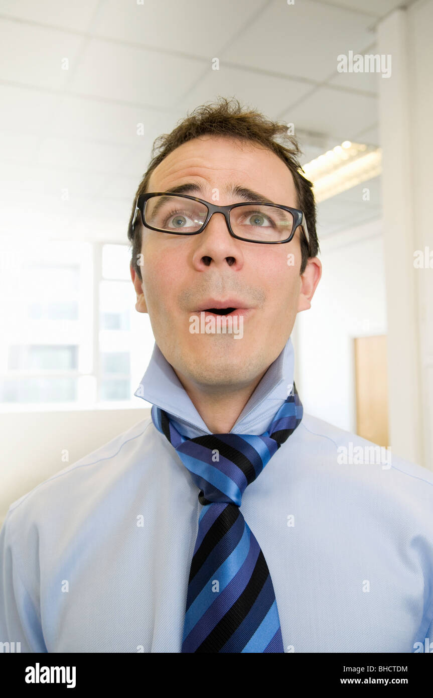 Portrait of a business man looking up Stock Photo - Alamy