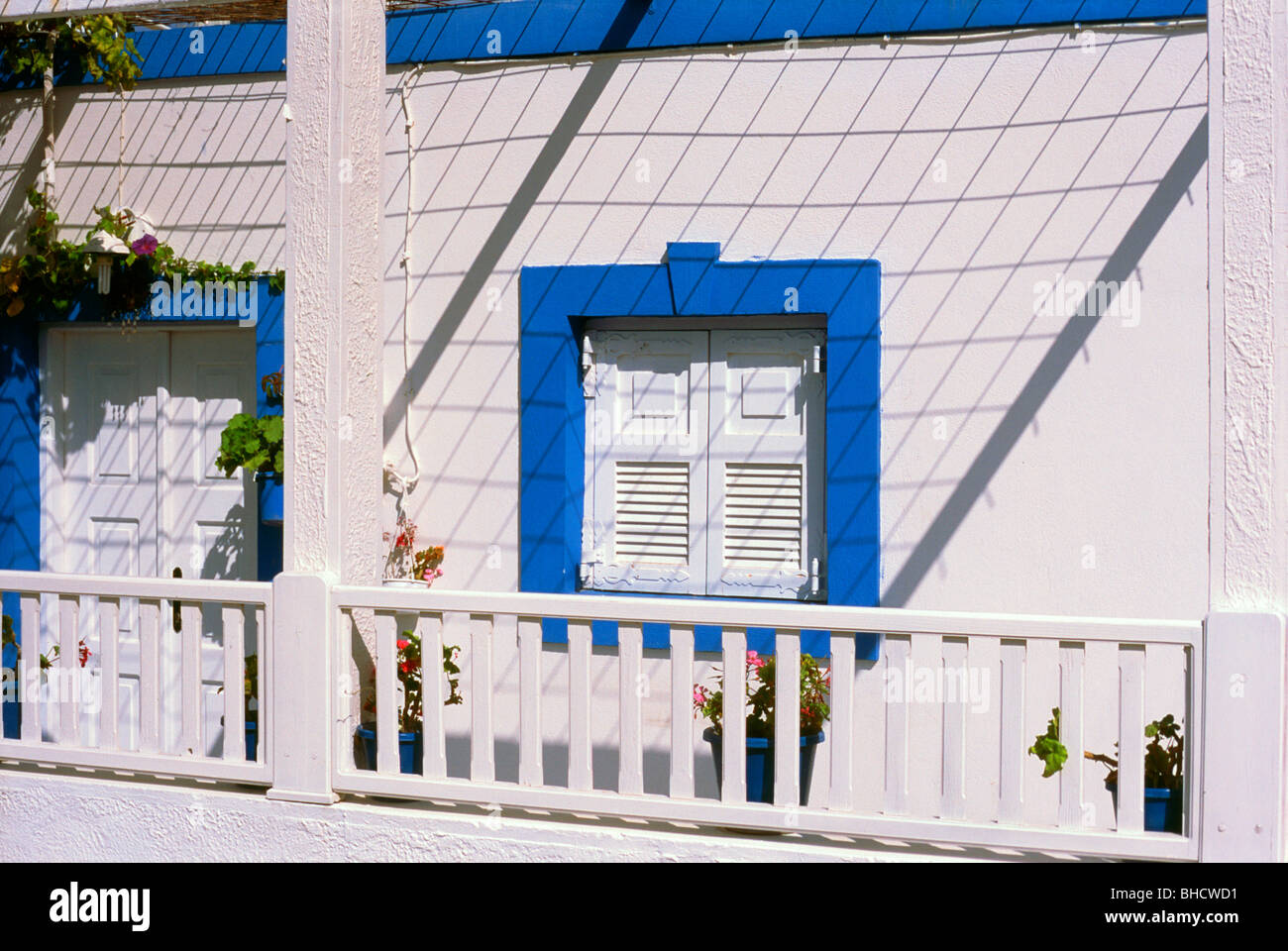 Typical blue painted windows in Kos Greece Stock Photo - Alamy