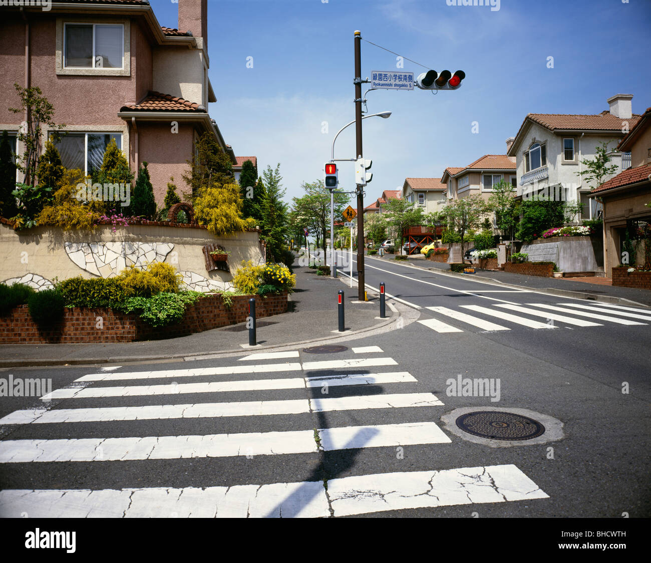 Traffic light and crosswalk in residential district, Ryokuentoshi ...