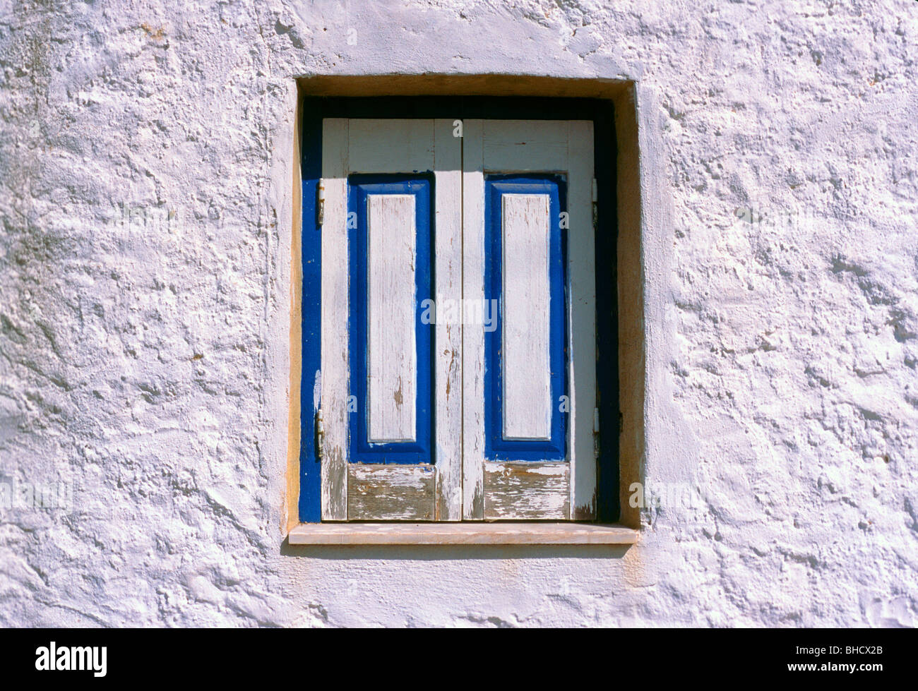 Typical blue painted window in Kos Greece Stock Photo - Alamy