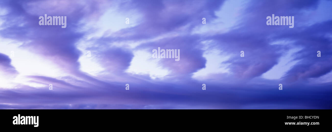 Purple cloudscape resembling faces, Hokkaido, Japan Stock Photo - Alamy