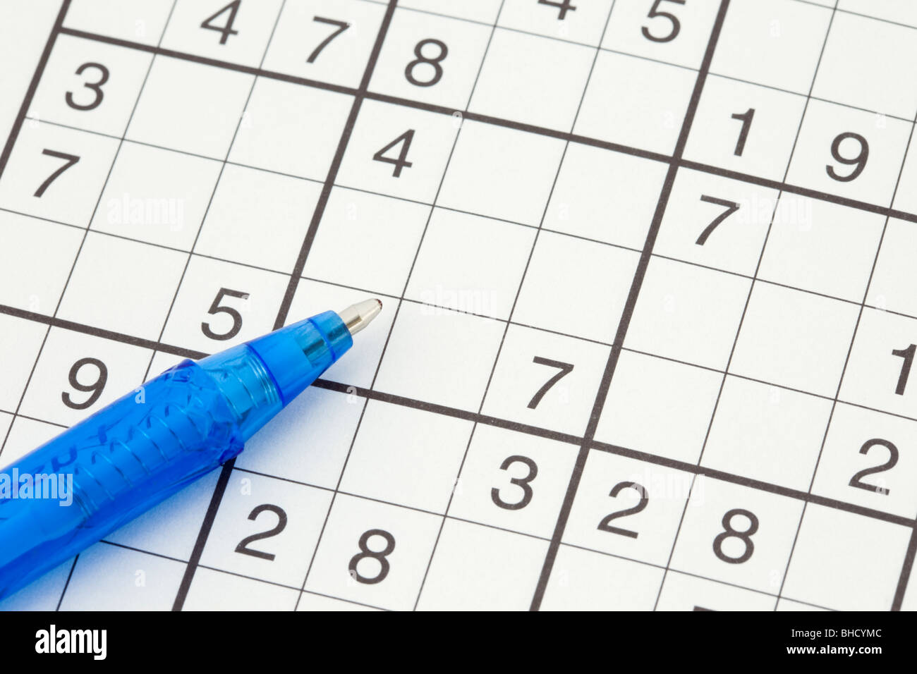 Suduko numbers game and pen close-up Stock Photo - Alamy