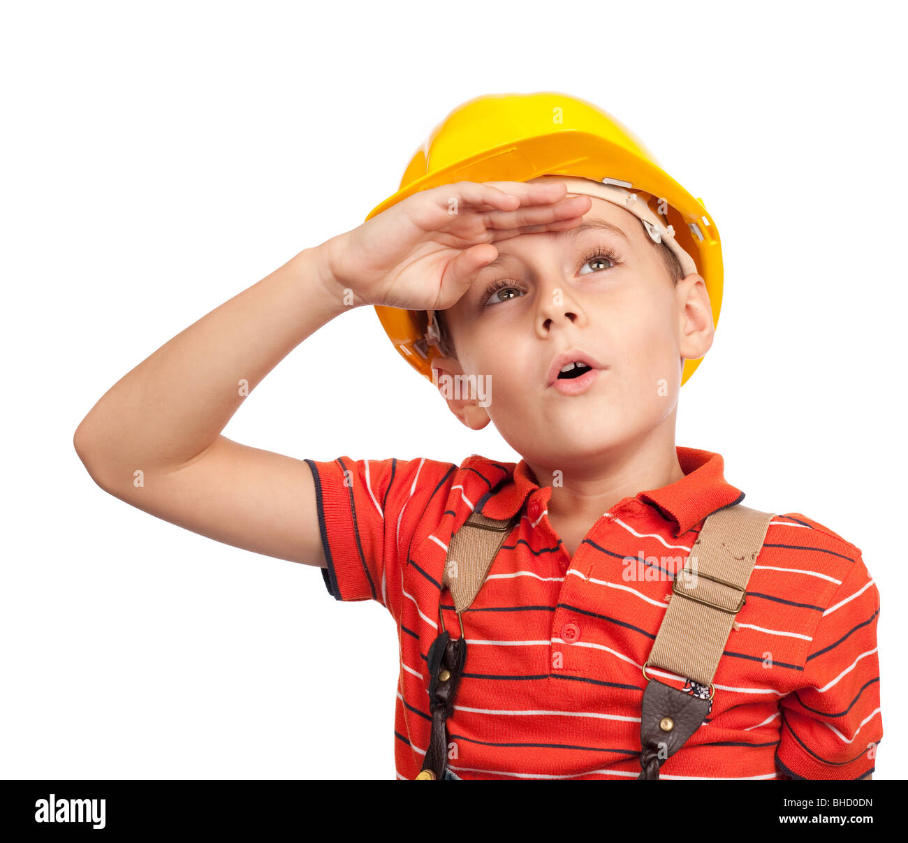 Close up portrait of a little boy posing as a tired construction worker ...