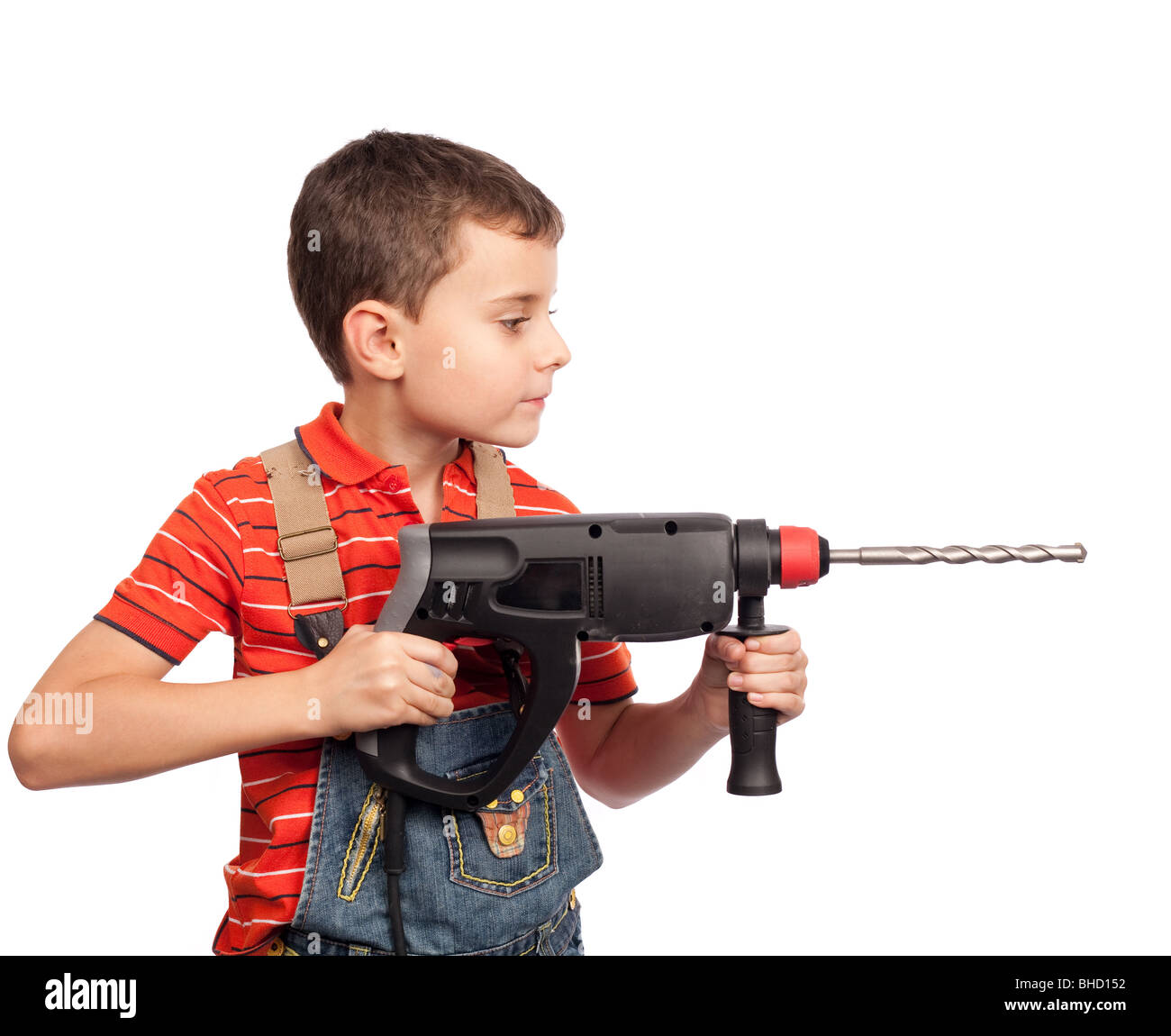 Cute kid as a construction worker with drilling machine Stock Photo - Alamy