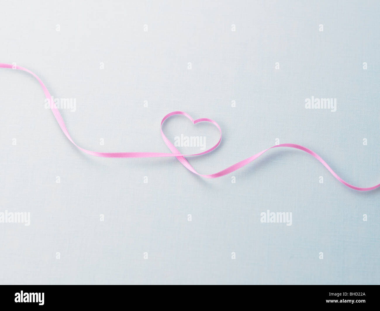 Ribbon making heart shape Stock Photo - Alamy