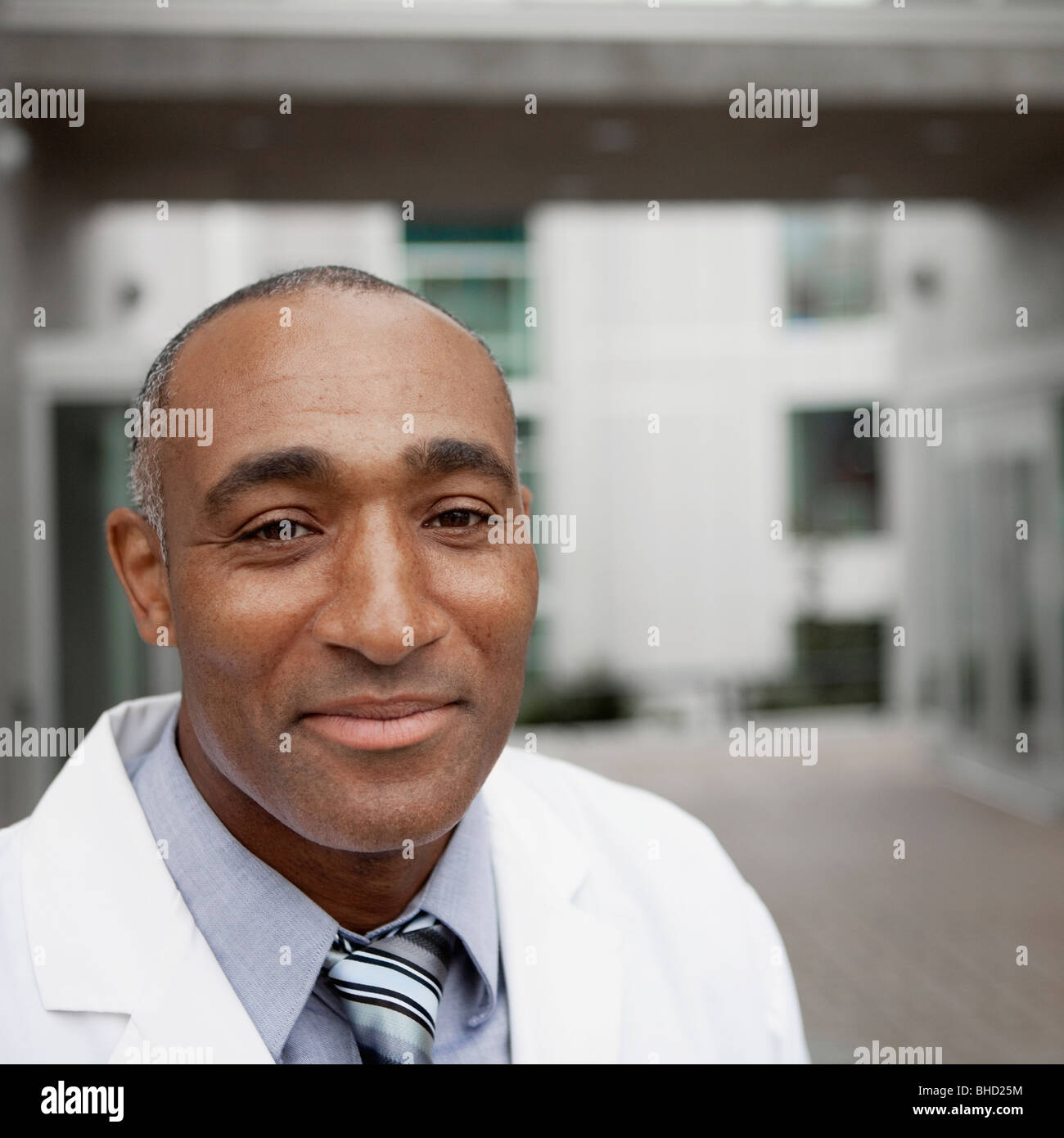 Mixed race doctor standing outdoors Stock Photo - Alamy