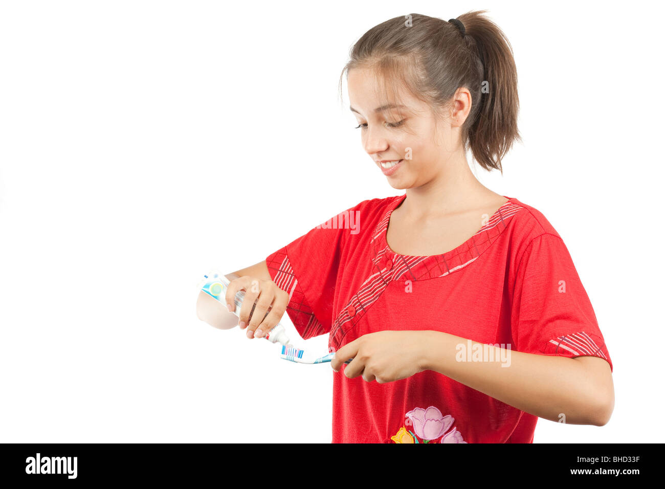 Young lady with toothpaste and toothbrush, isolated on white Stock ...