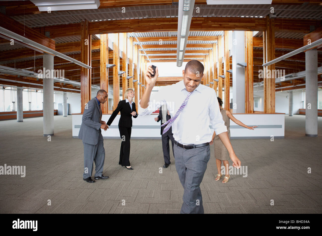 Business people dancing in empty office space Stock Photo - Alamy