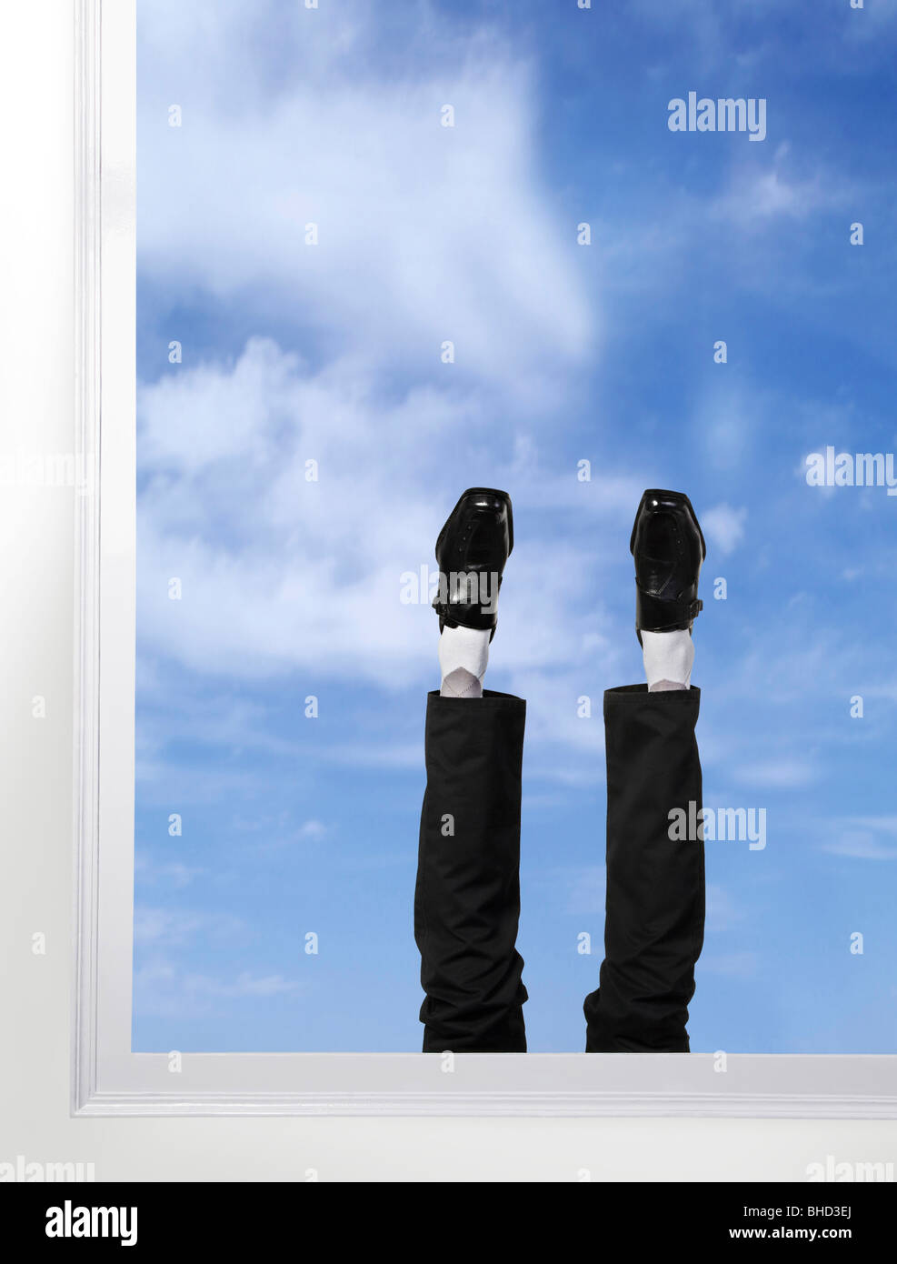 Legs of a businessman outside a window Stock Photo - Alamy